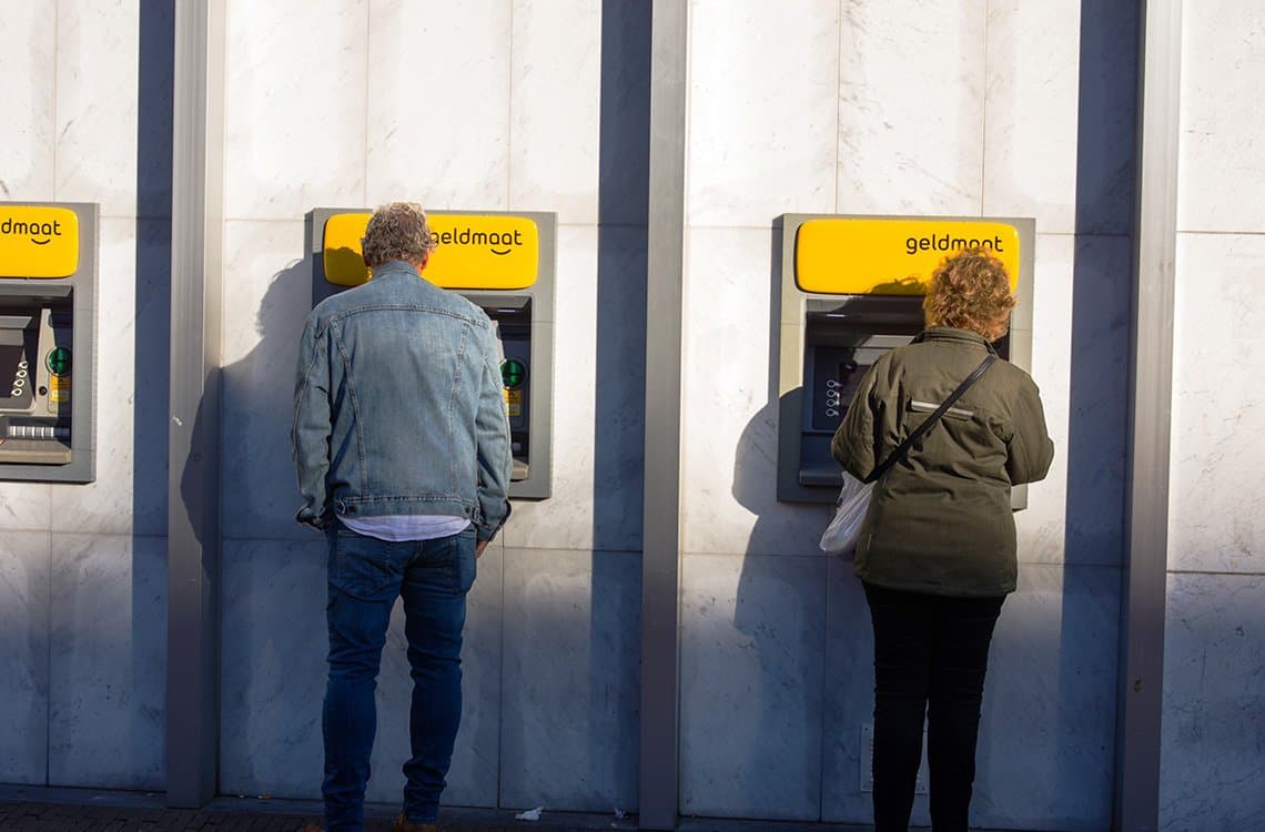 Dutch Cashless Crash Leads to Rush on ATMs